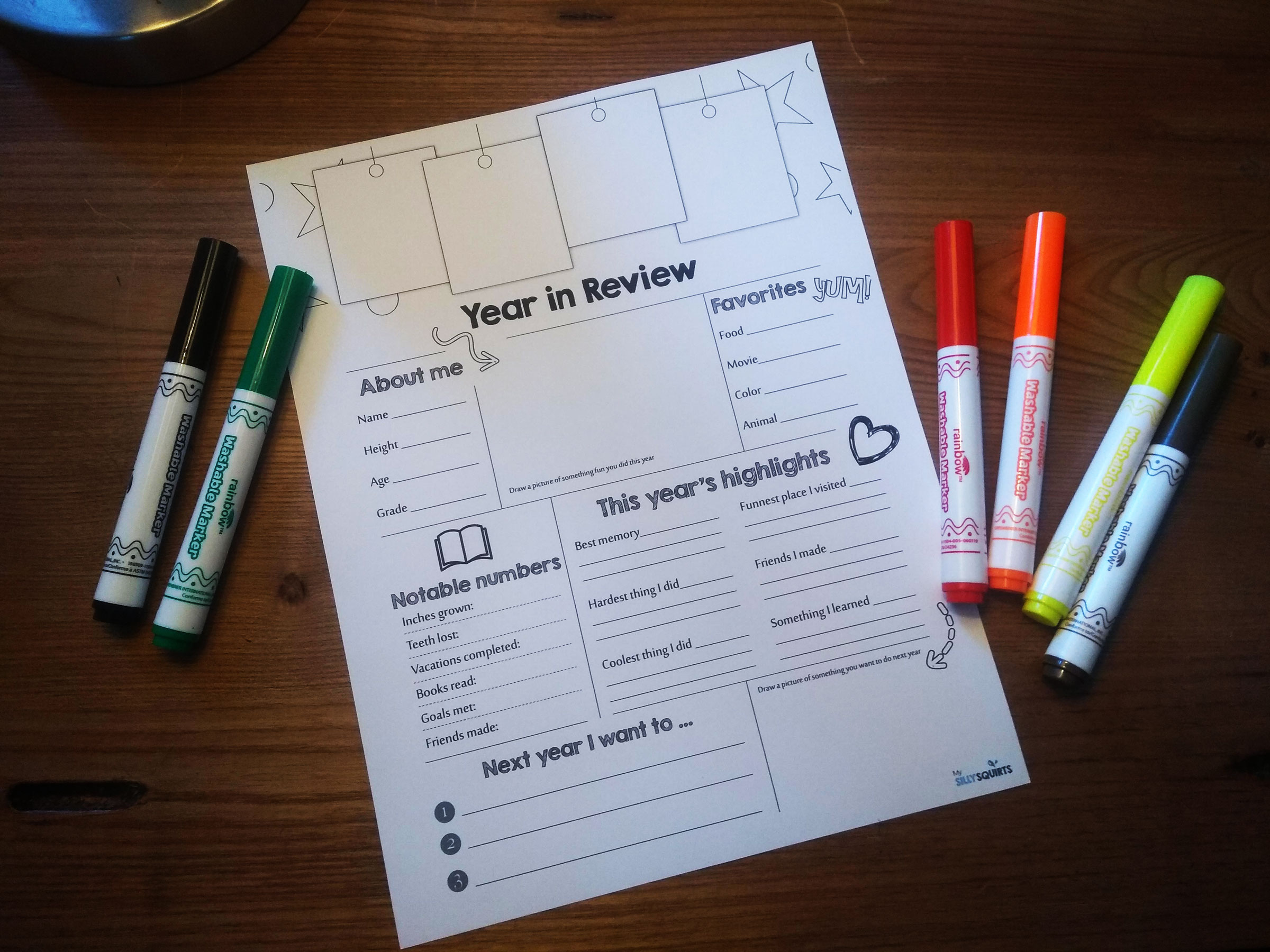 Capture memories with this FREE Year in Review printable - My Silly Squirts