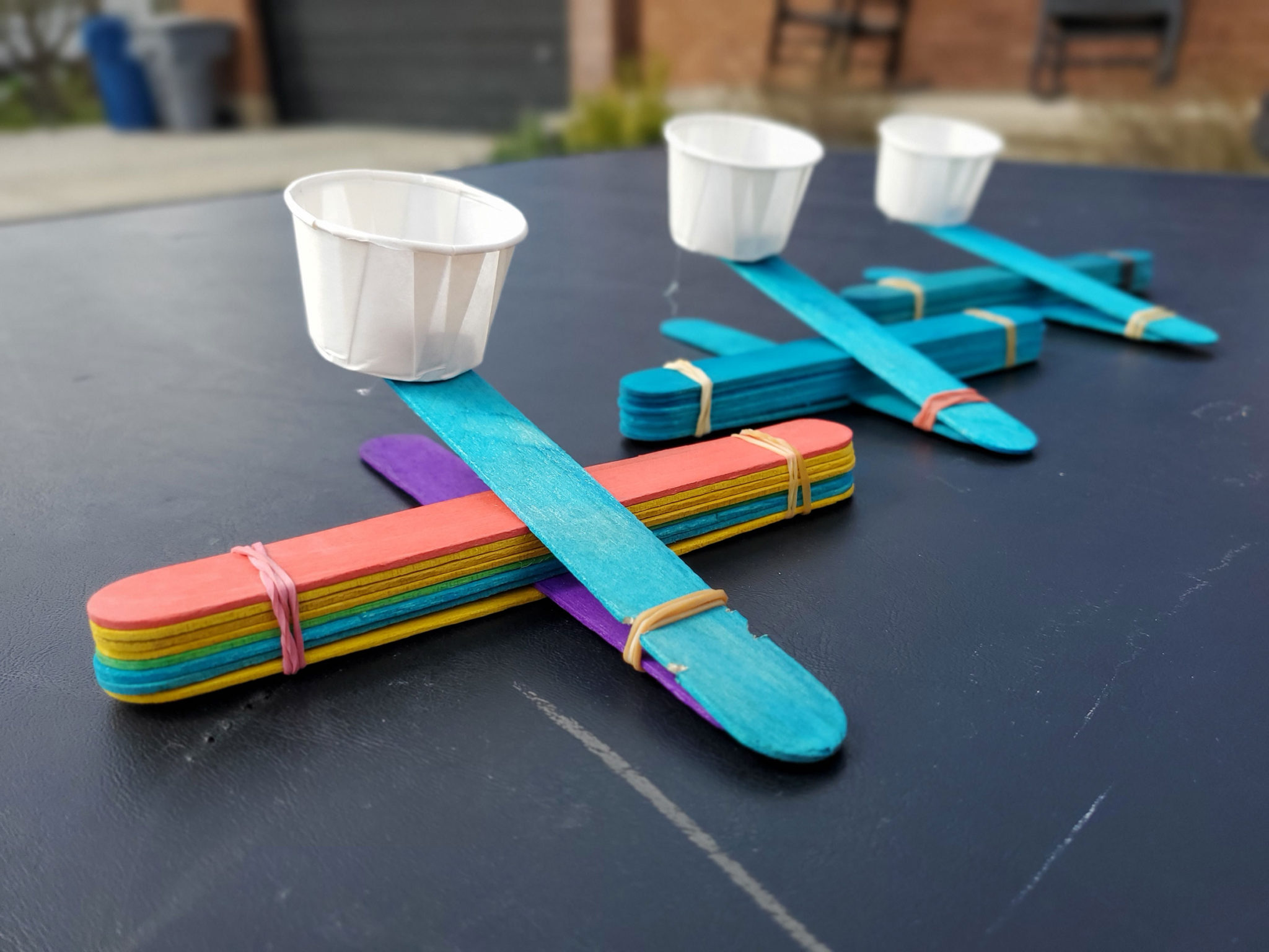 Launch into fun with a DIY popsicle stick catapult - My Silly Squirts