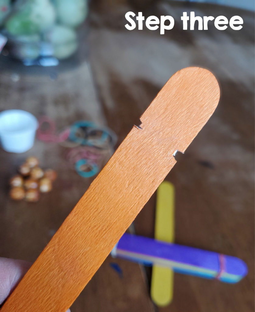 Launch into fun with a DIY popsicle stick catapult - My Silly Squirts